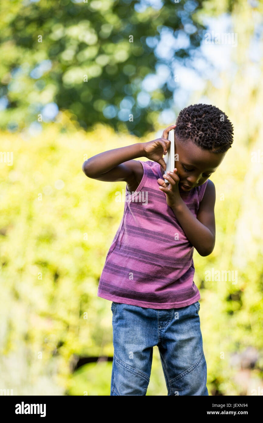 A child is having phone call Stock Photo - Alamy