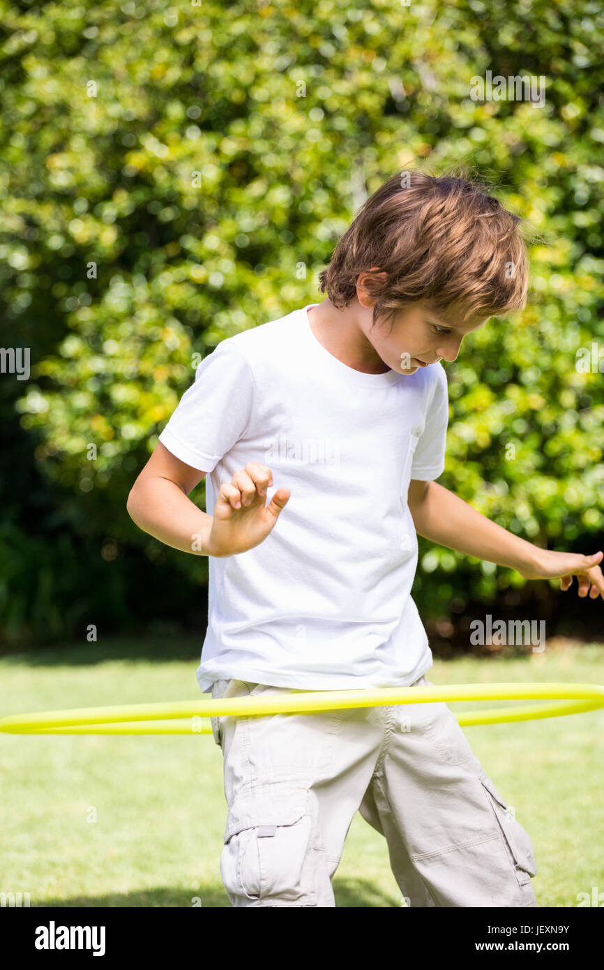 Child playing with a hoop Stock Photo - Alamy