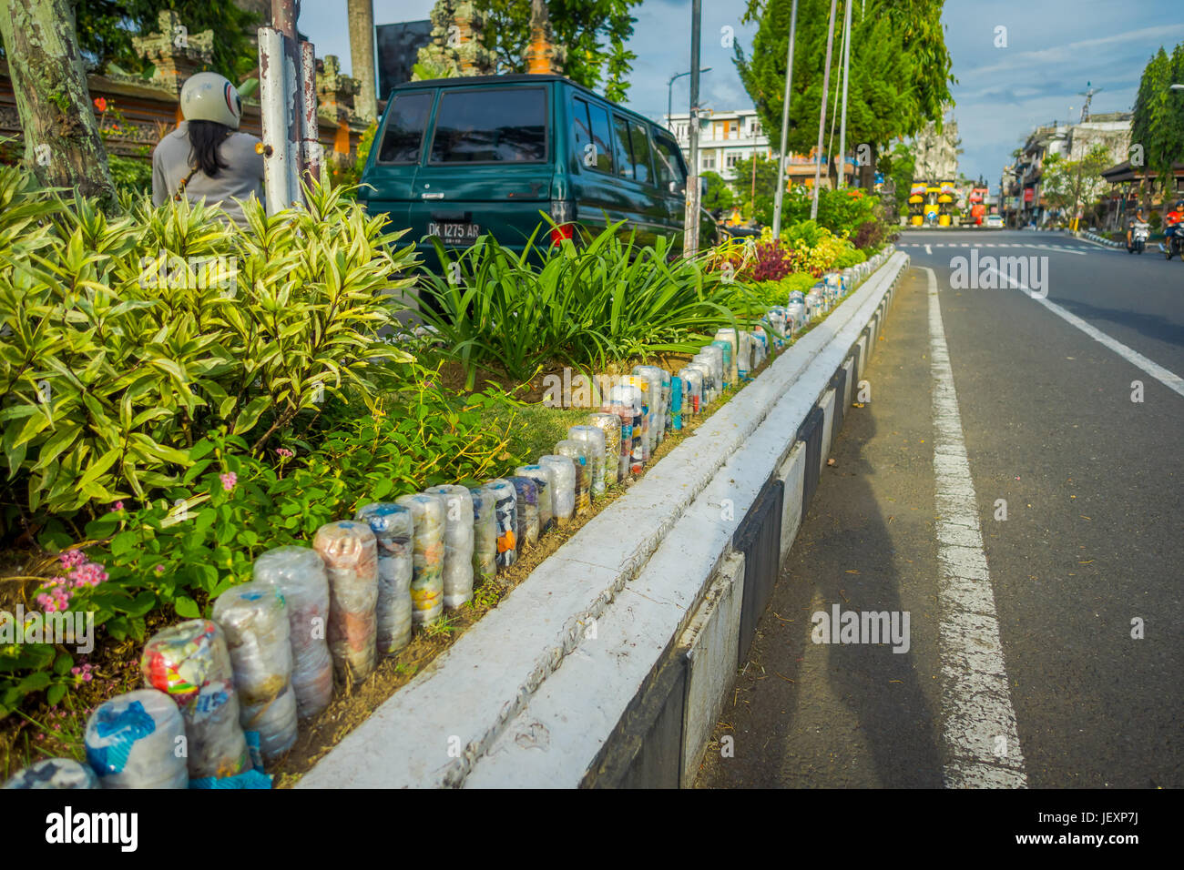 BALI, INDONESIA - MARCH 08, 2017: A plastic water bottles in the park ...