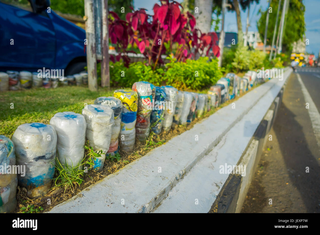 BALI, INDONESIA - MARCH 08, 2017: A plastic water bottles in the park ...