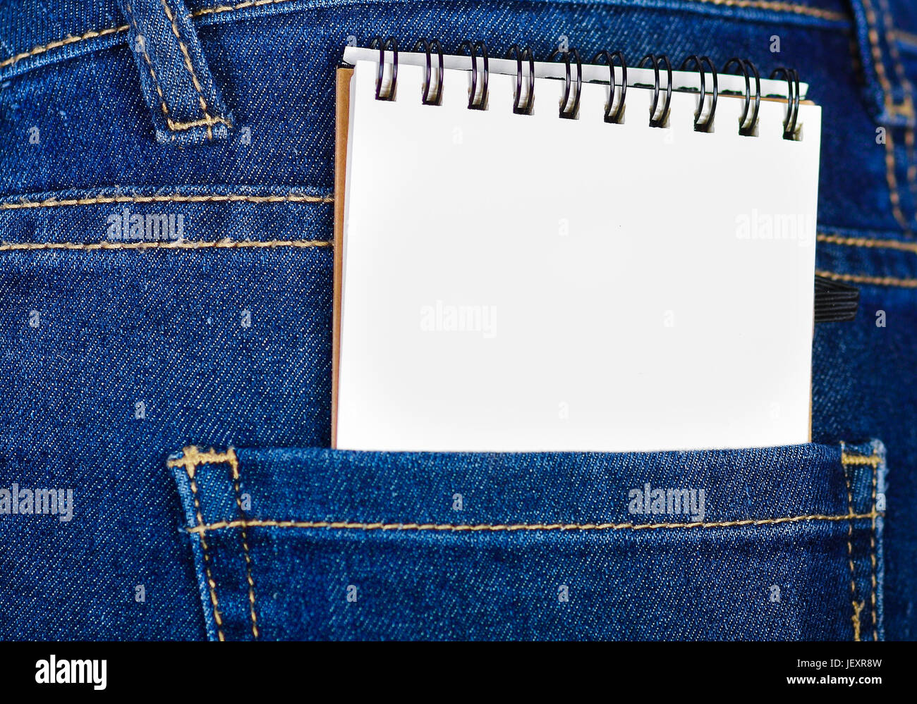White small notebook inside of jeans back pocket Stock Photo - Alamy