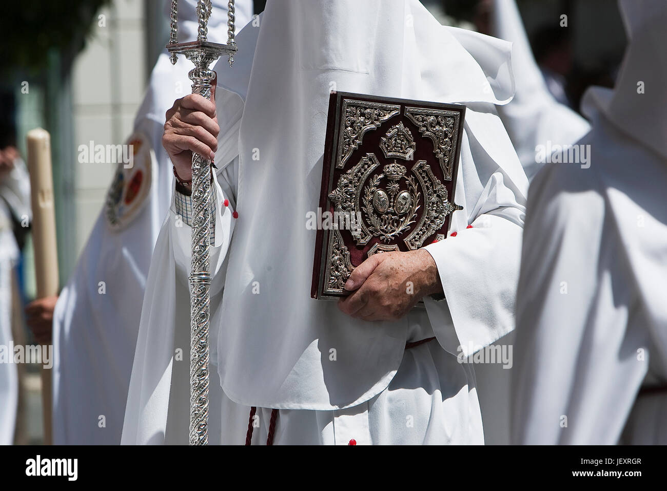 penitent with the rule book governing the brotherhood with velvet caps ...