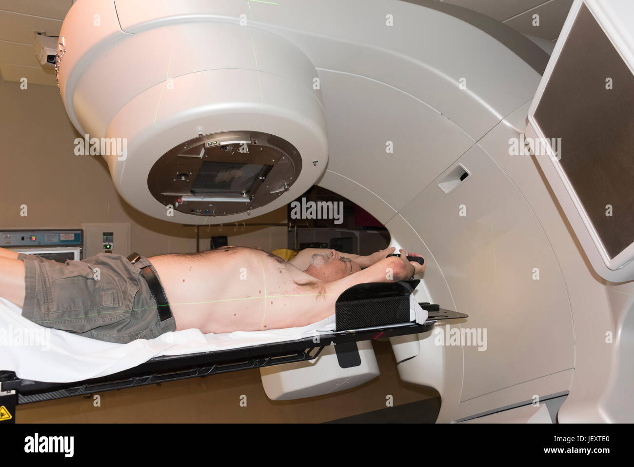 Patient Radiation therapy showing laser lines for targeting cancer ...
