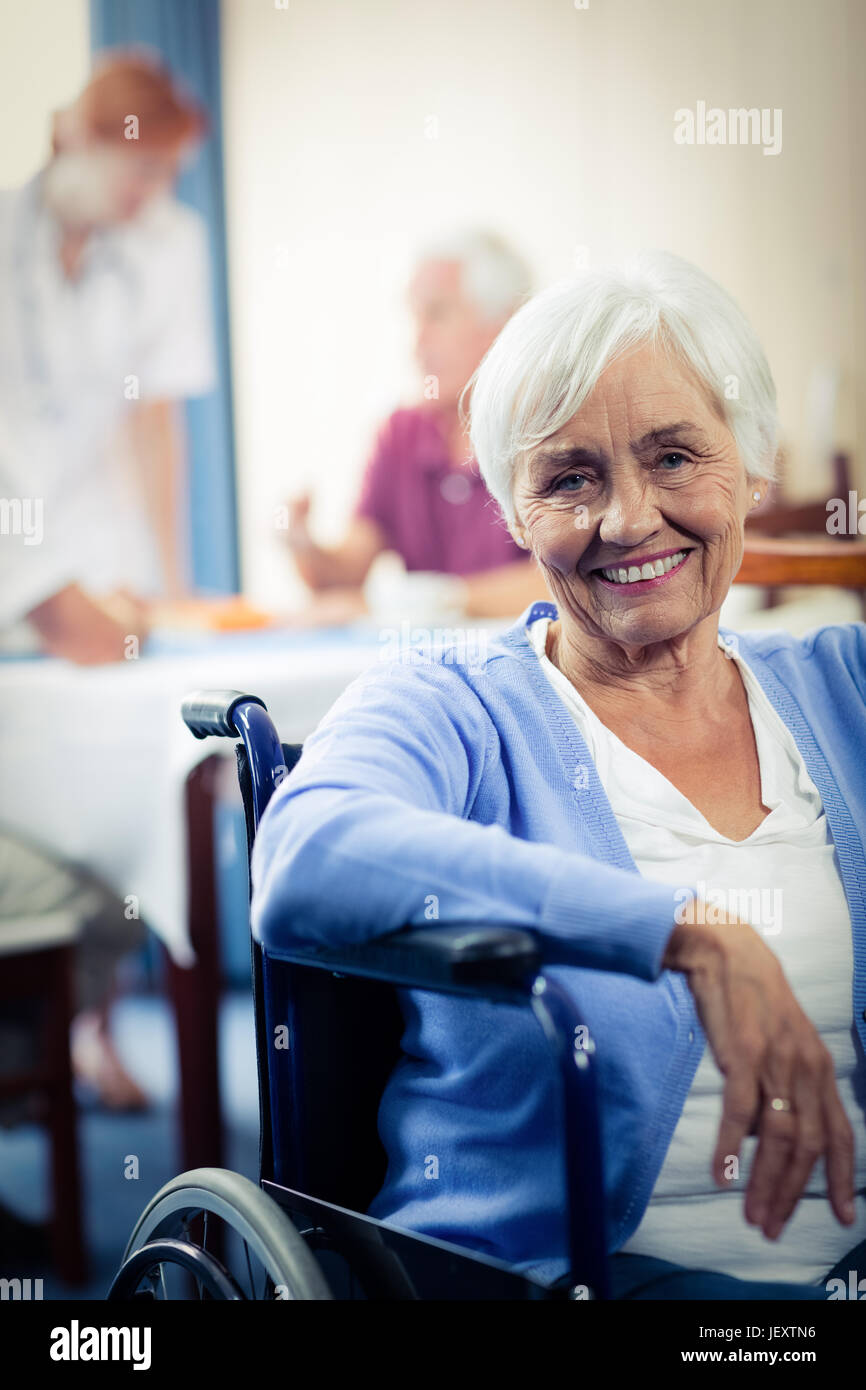 Portrait of a senior woman in wheelchair Stock Photo - Alamy