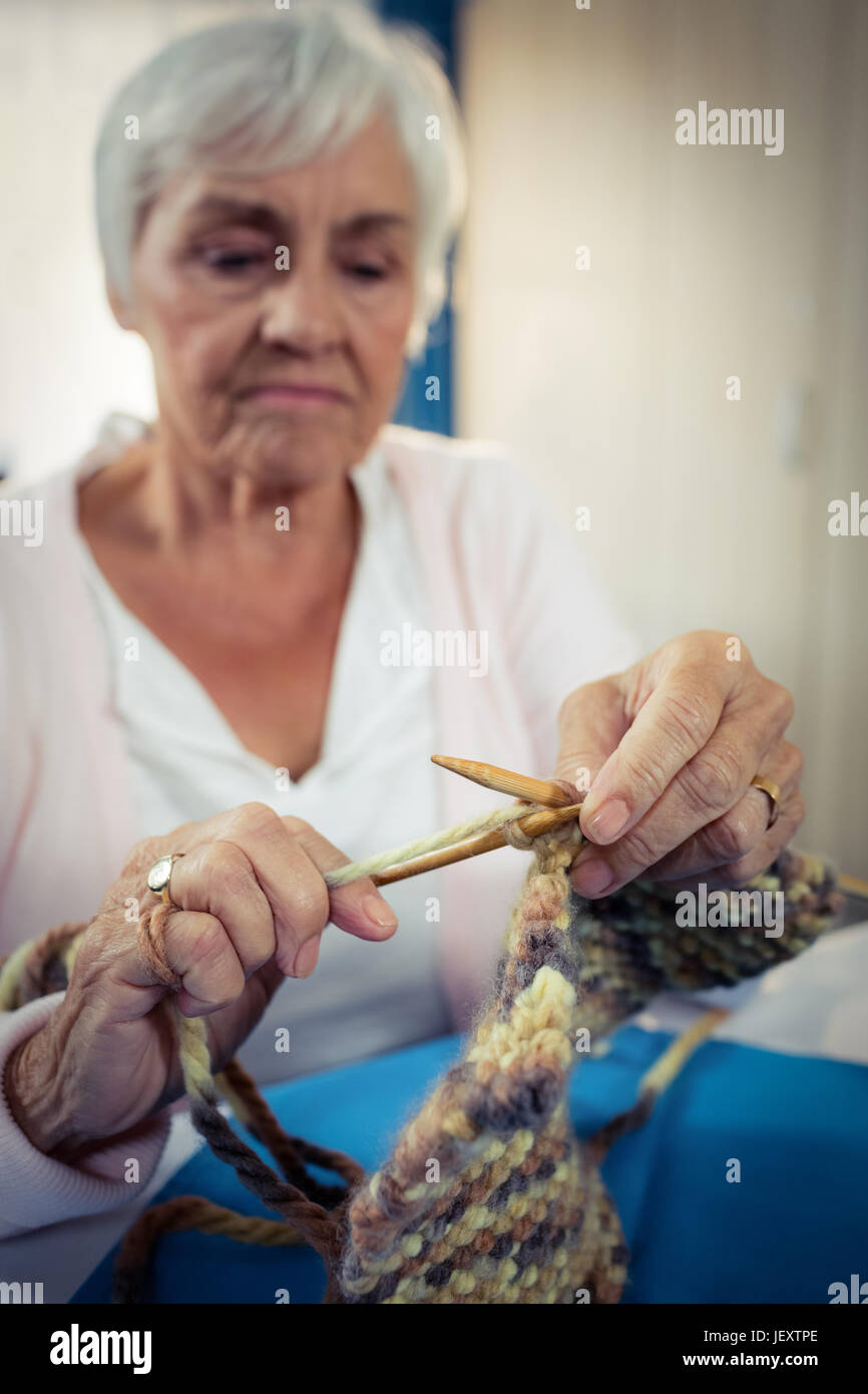 Senior woman sewing Stock Photo - Alamy
