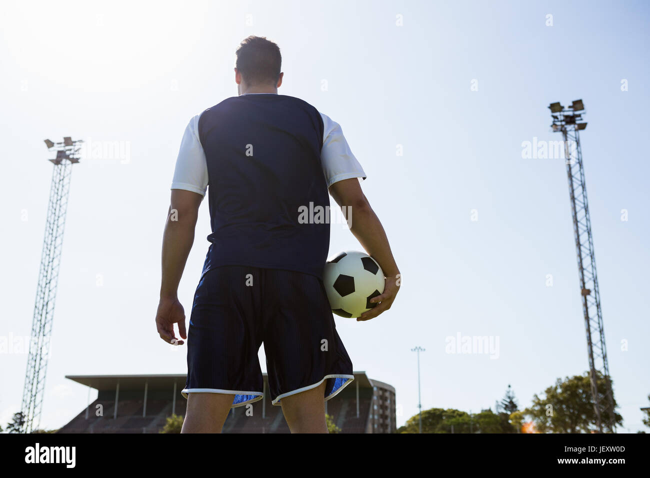 Soccer player holding ball under hi-res stock photography and images ...