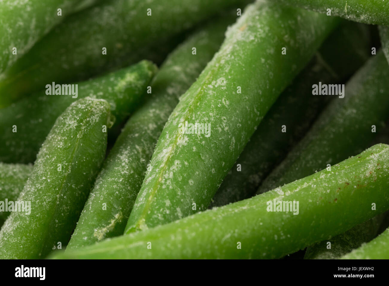 Frozen cut green beans vegetable, closeup for background Stock Photo ...