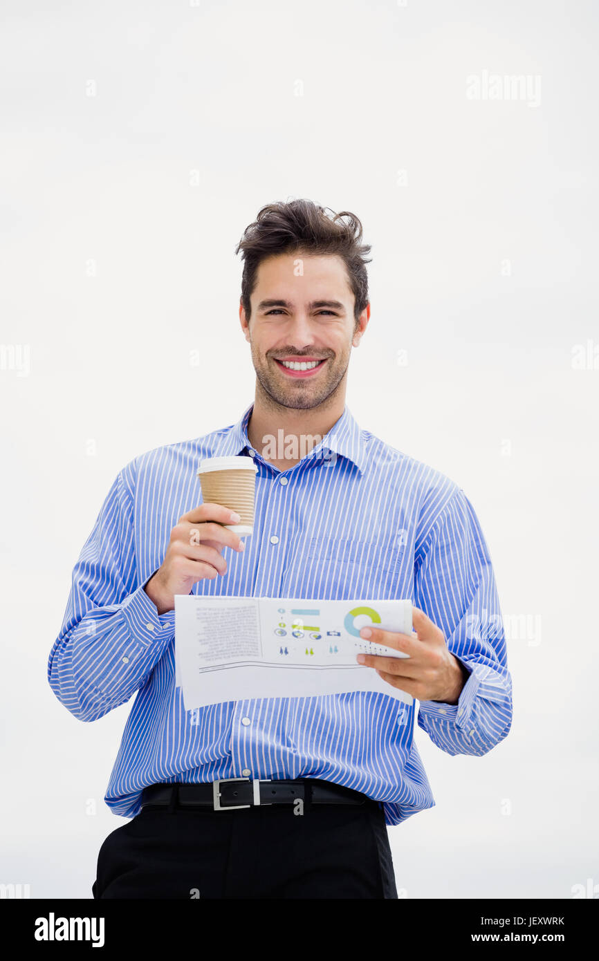 Businessman Reading A Newspaper Stock Photo Alamy
