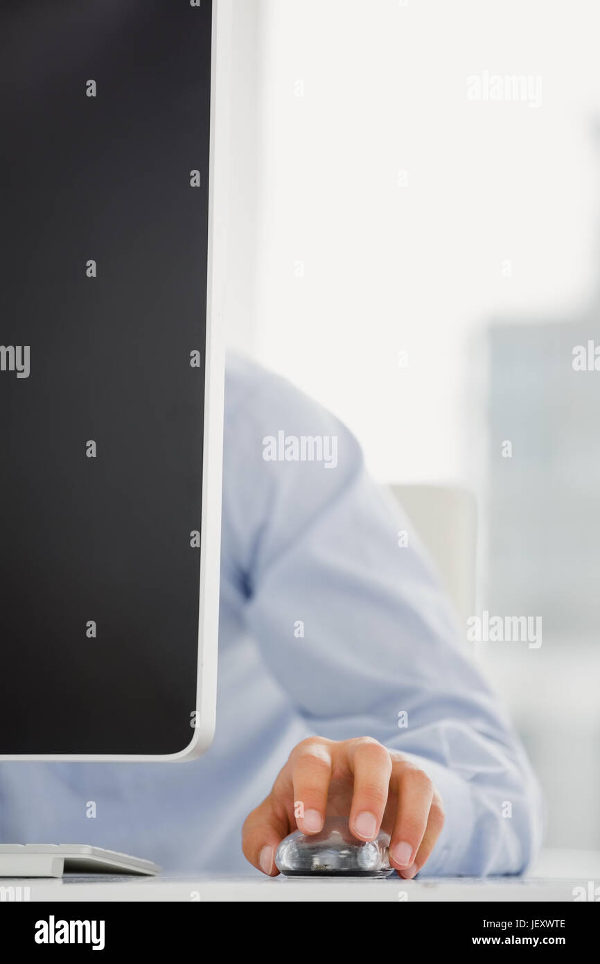 Mid-section of mans hand working on computer Stock Photo - Alamy