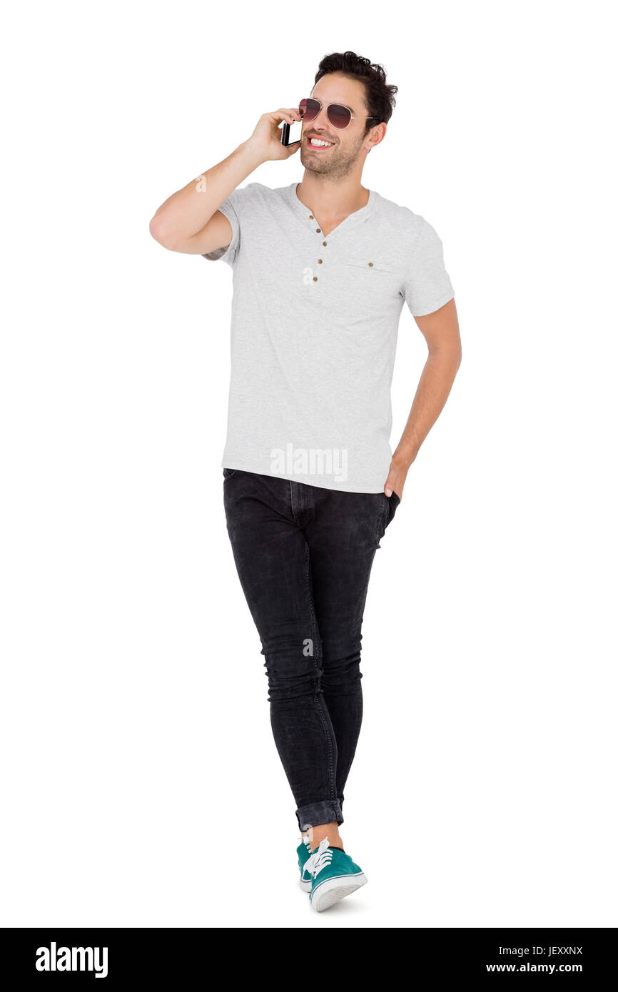 Man standing using phone Cut Out Stock Images & Pictures - Alamy