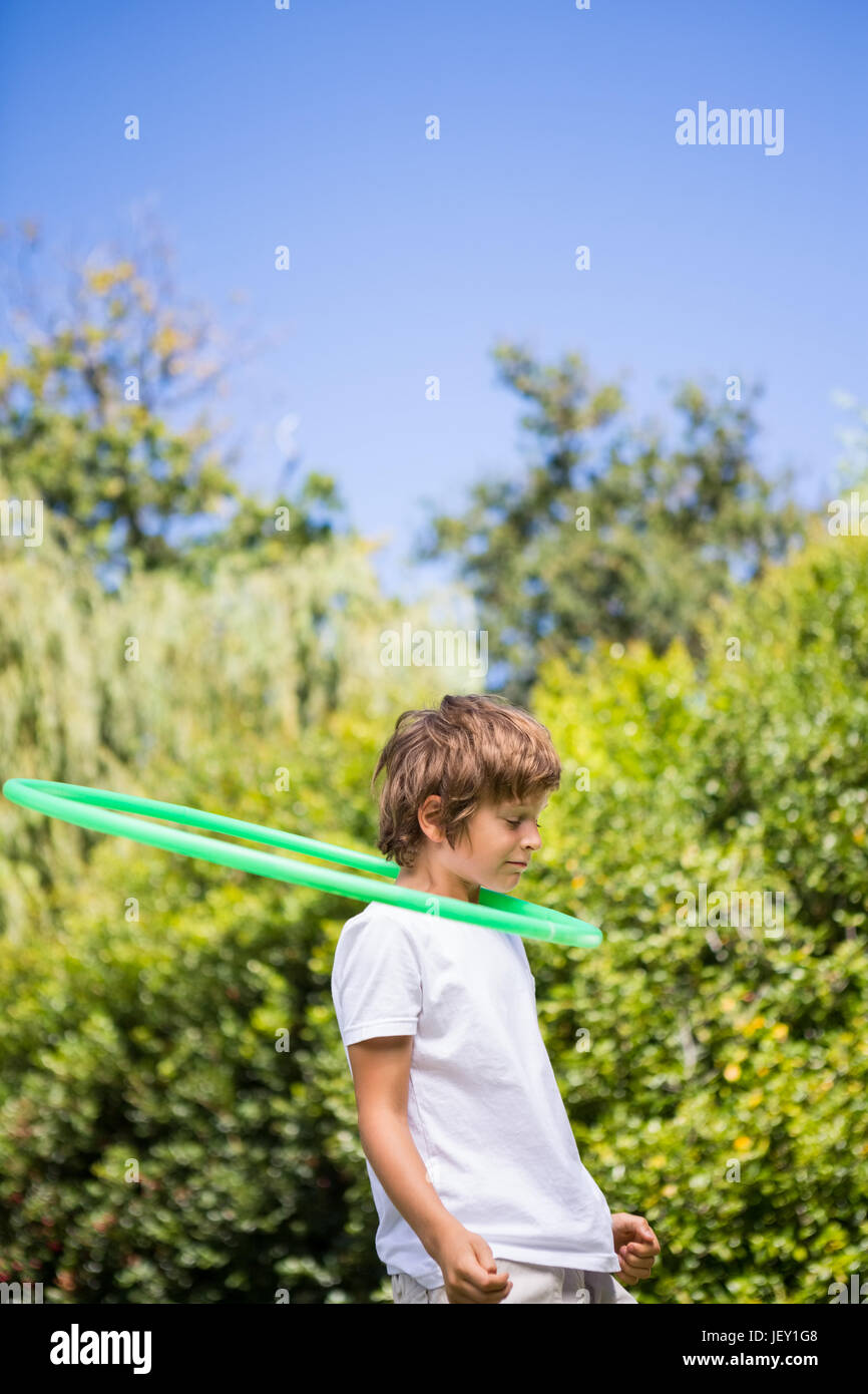 Child playing with a hoop Stock Photo - Alamy