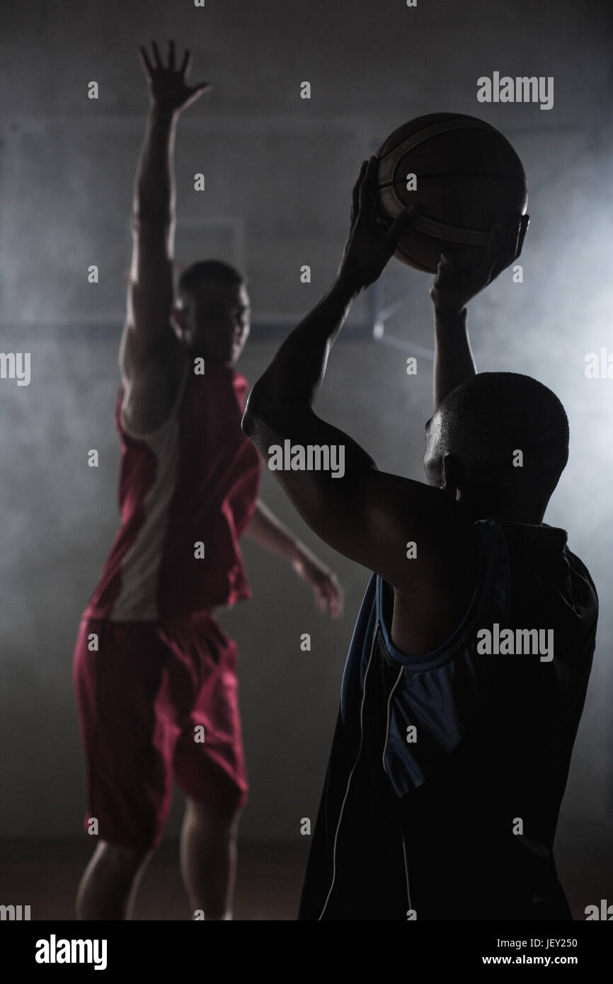 Man bouncing basketball hi-res stock photography and images - Alamy