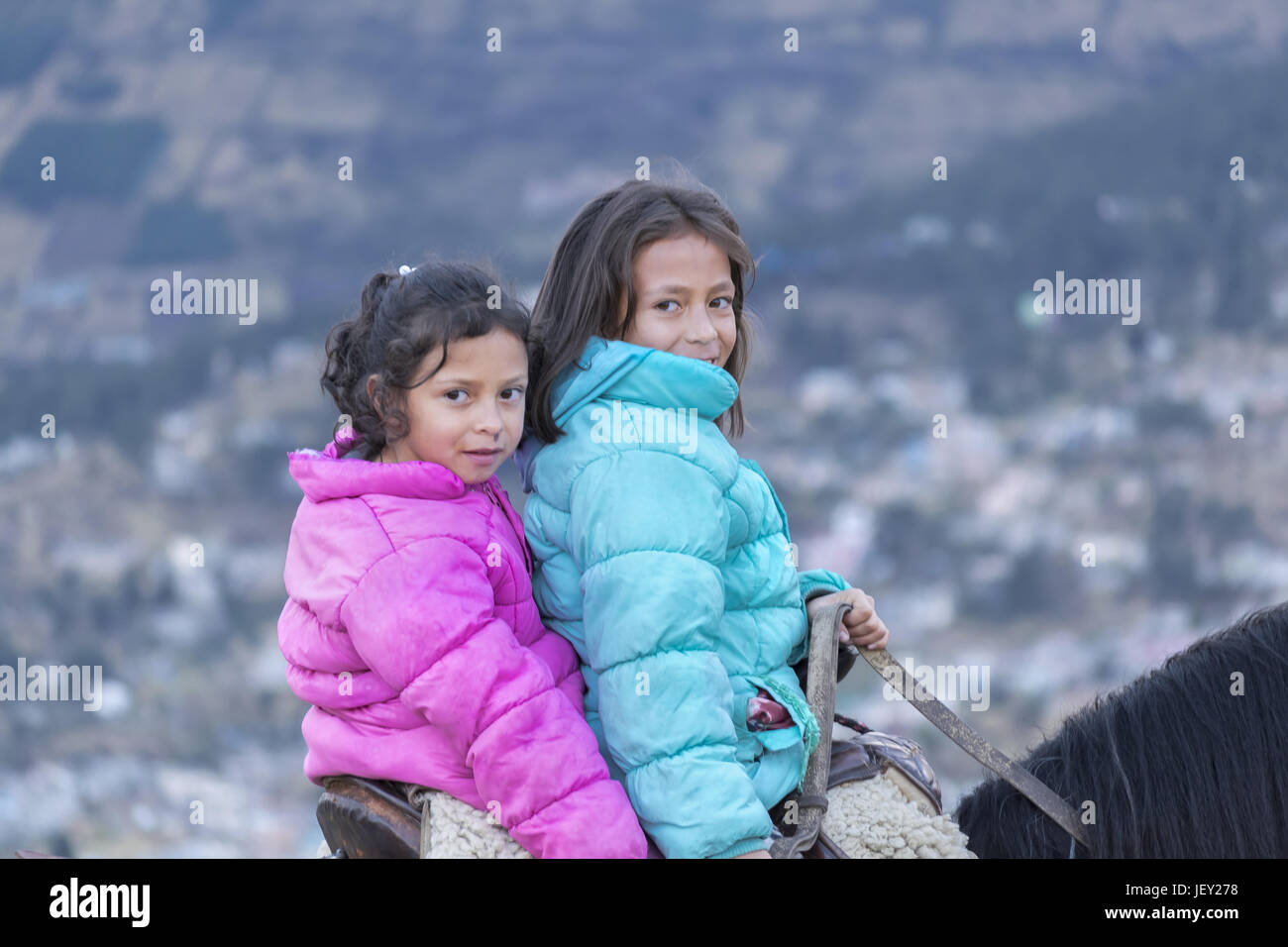 Two girls riding horse hi-res stock photography and images - Alamy
