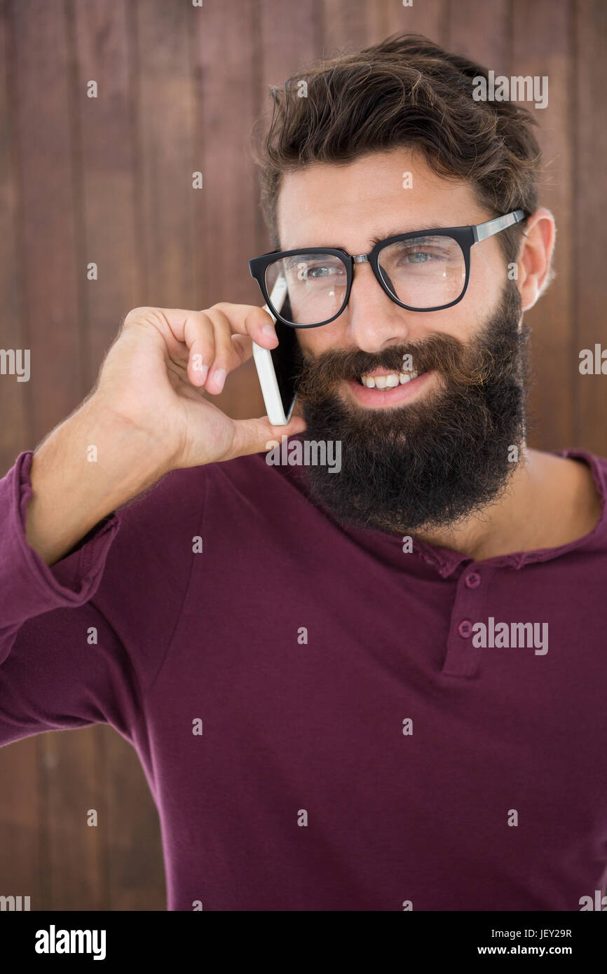 Hipster man calling someone Stock Photo - Alamy