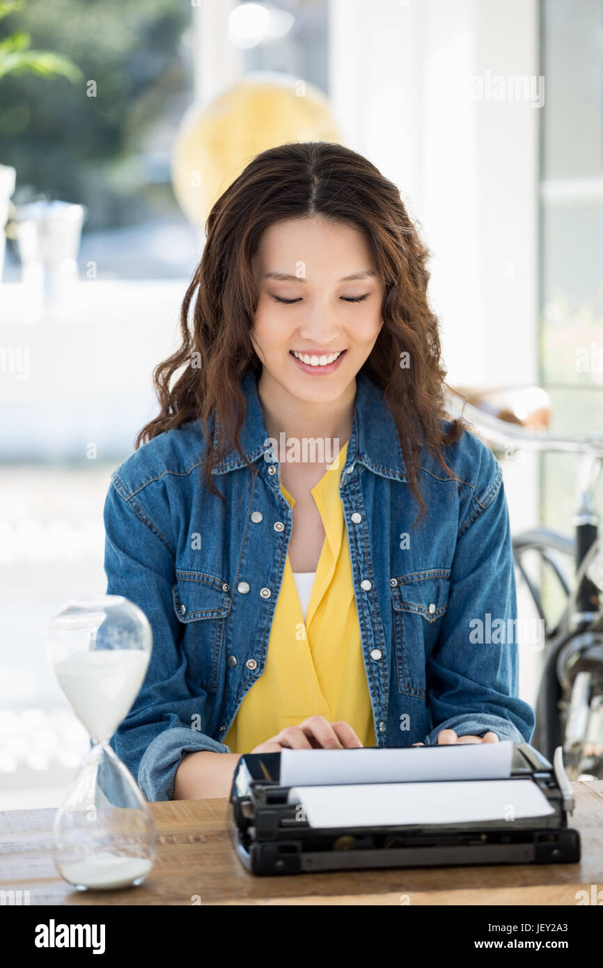Male writer using typing machine hi-res stock photography and images ...