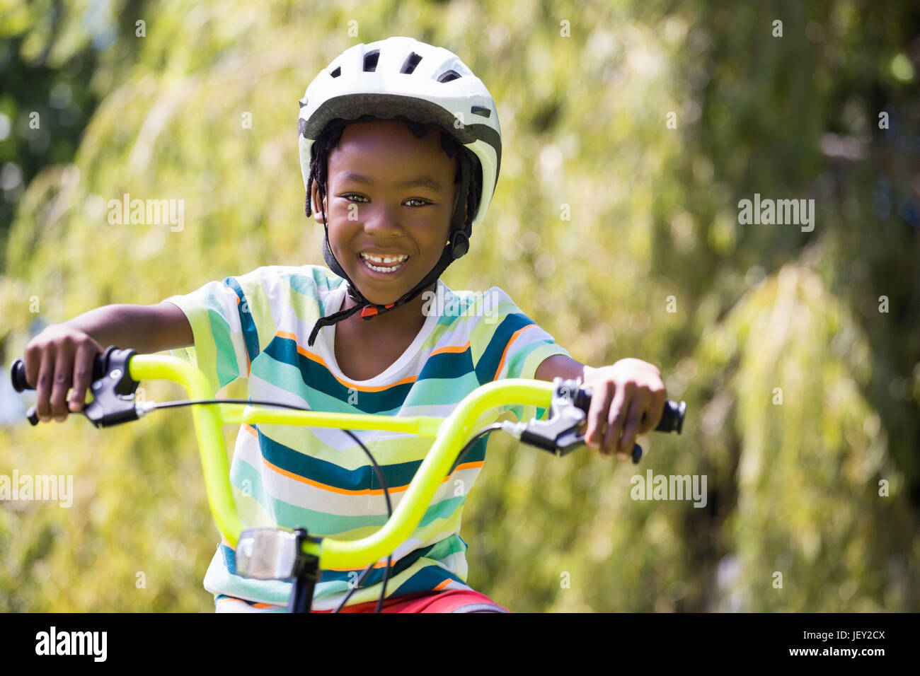A sporty kid bike riding Stock Photo - Alamy