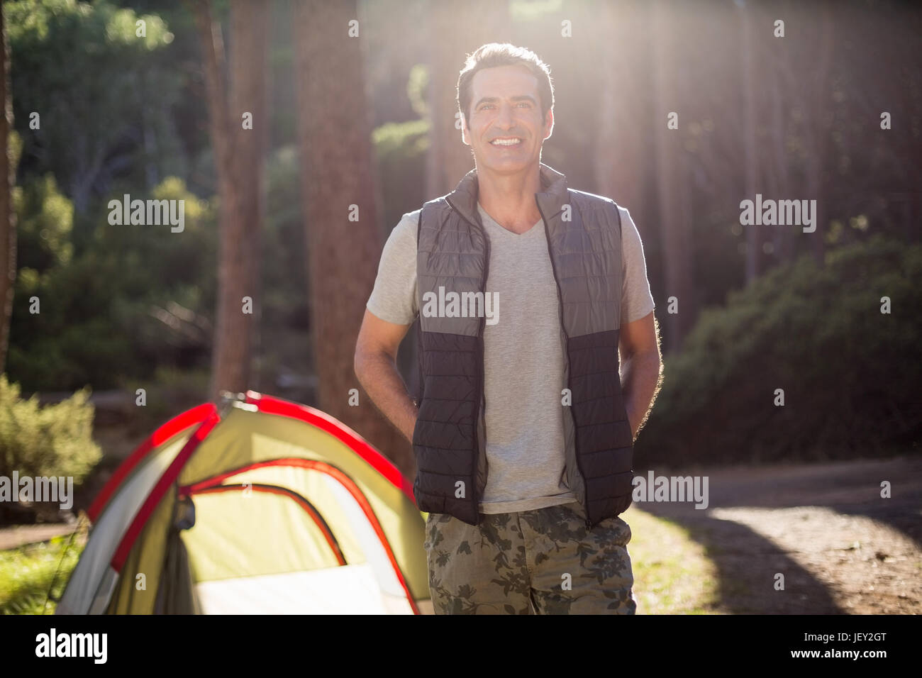 Man smiling and posing Stock Photo - Alamy