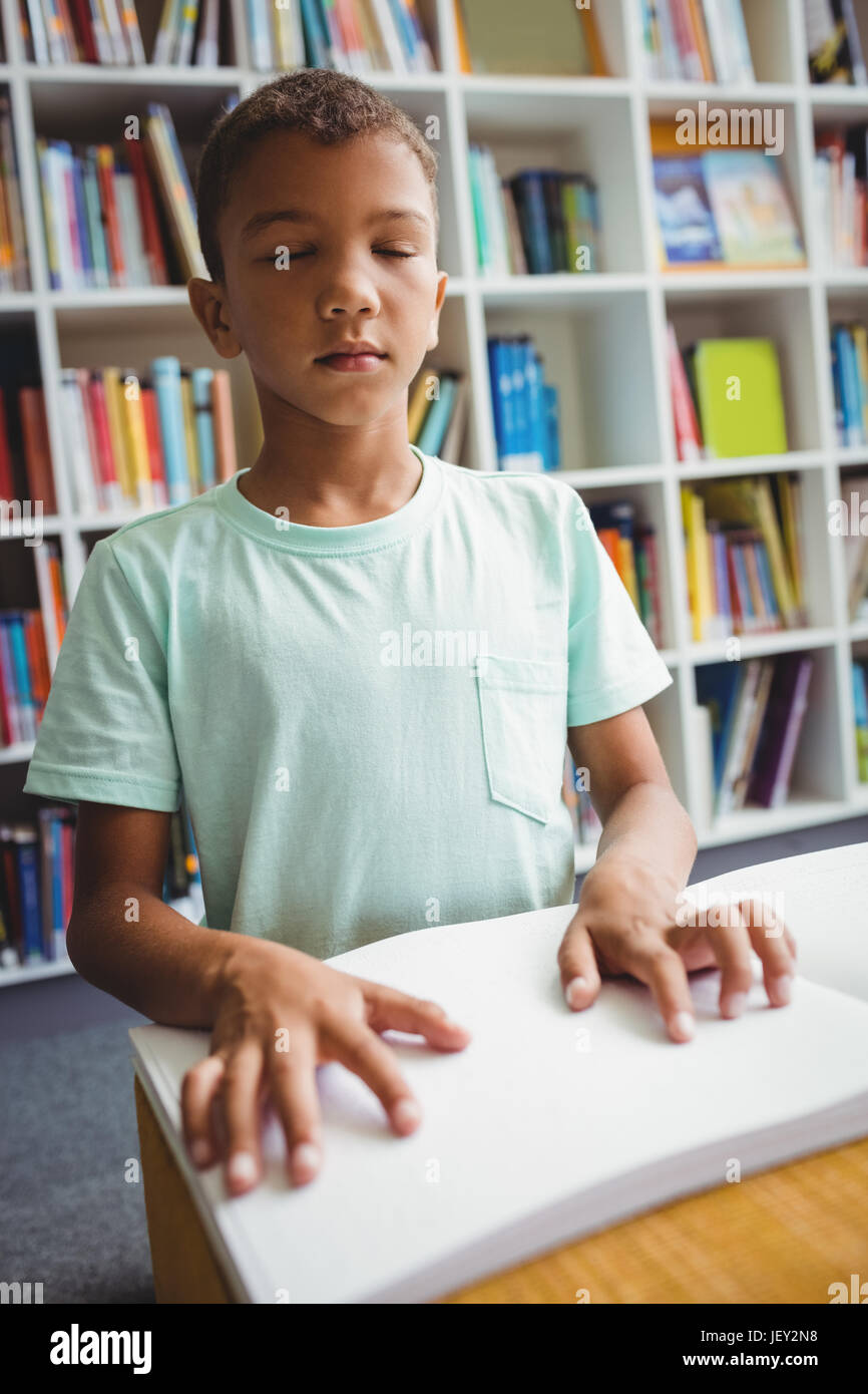 Child reading braille book hi-res stock photography and images - Alamy