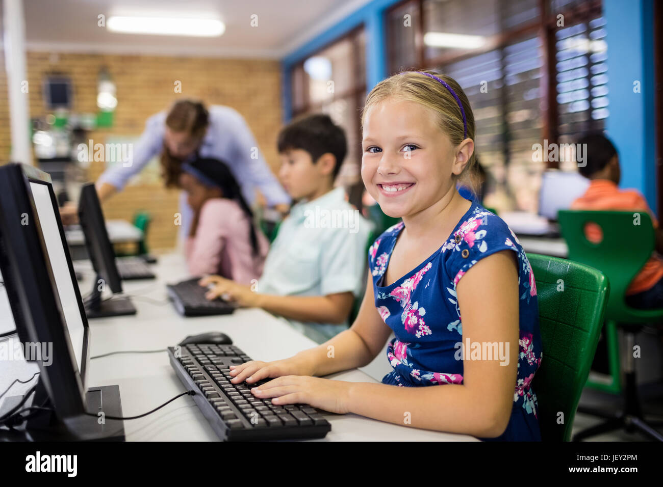 Children using computer mouse hi-res stock photography and images - Alamy