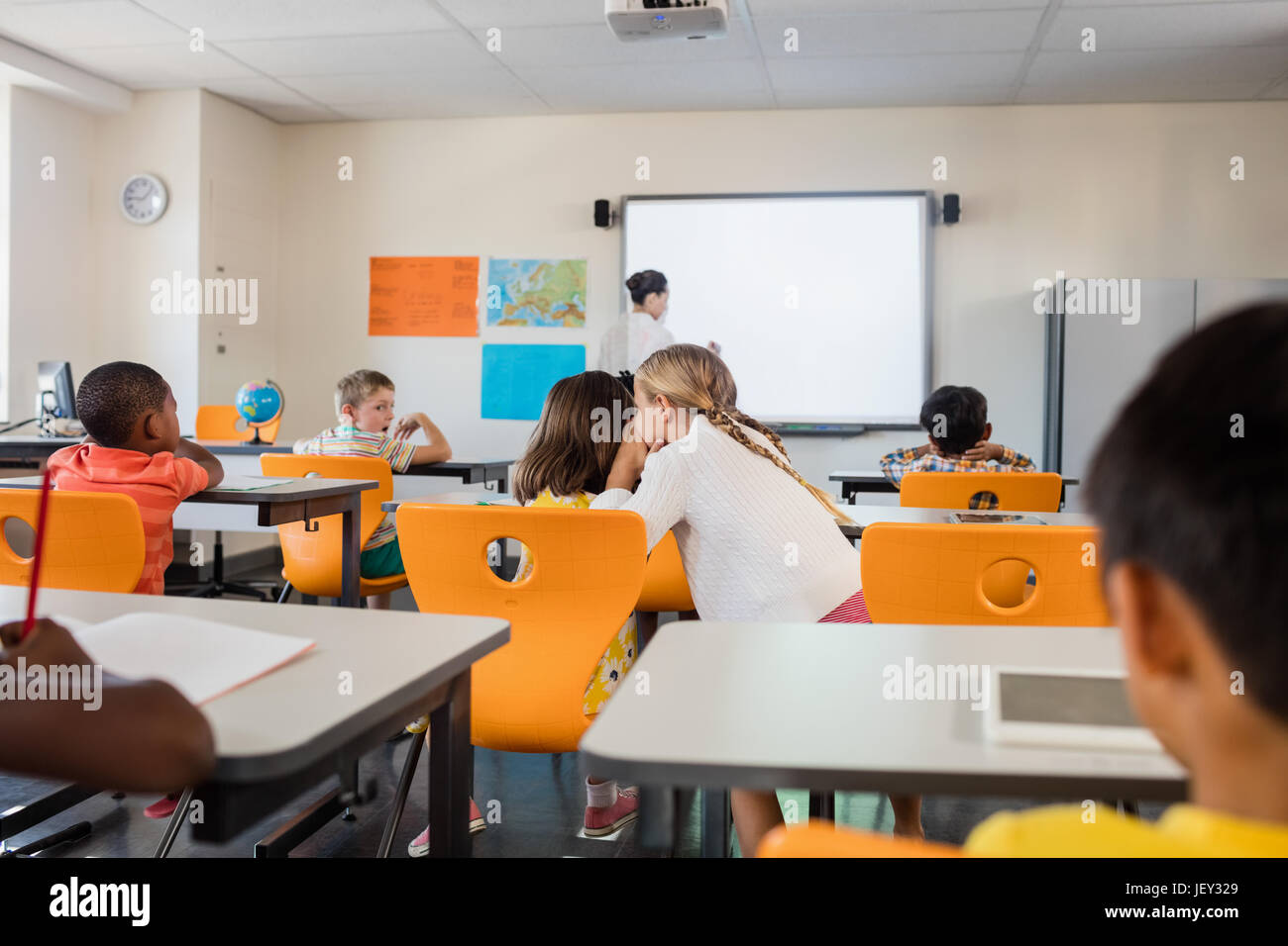Students speaking together Stock Photo - Alamy