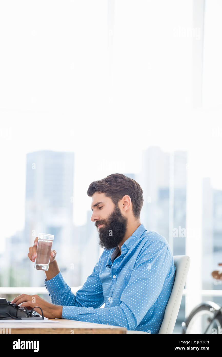 Male writer using typing machine hi-res stock photography and images ...