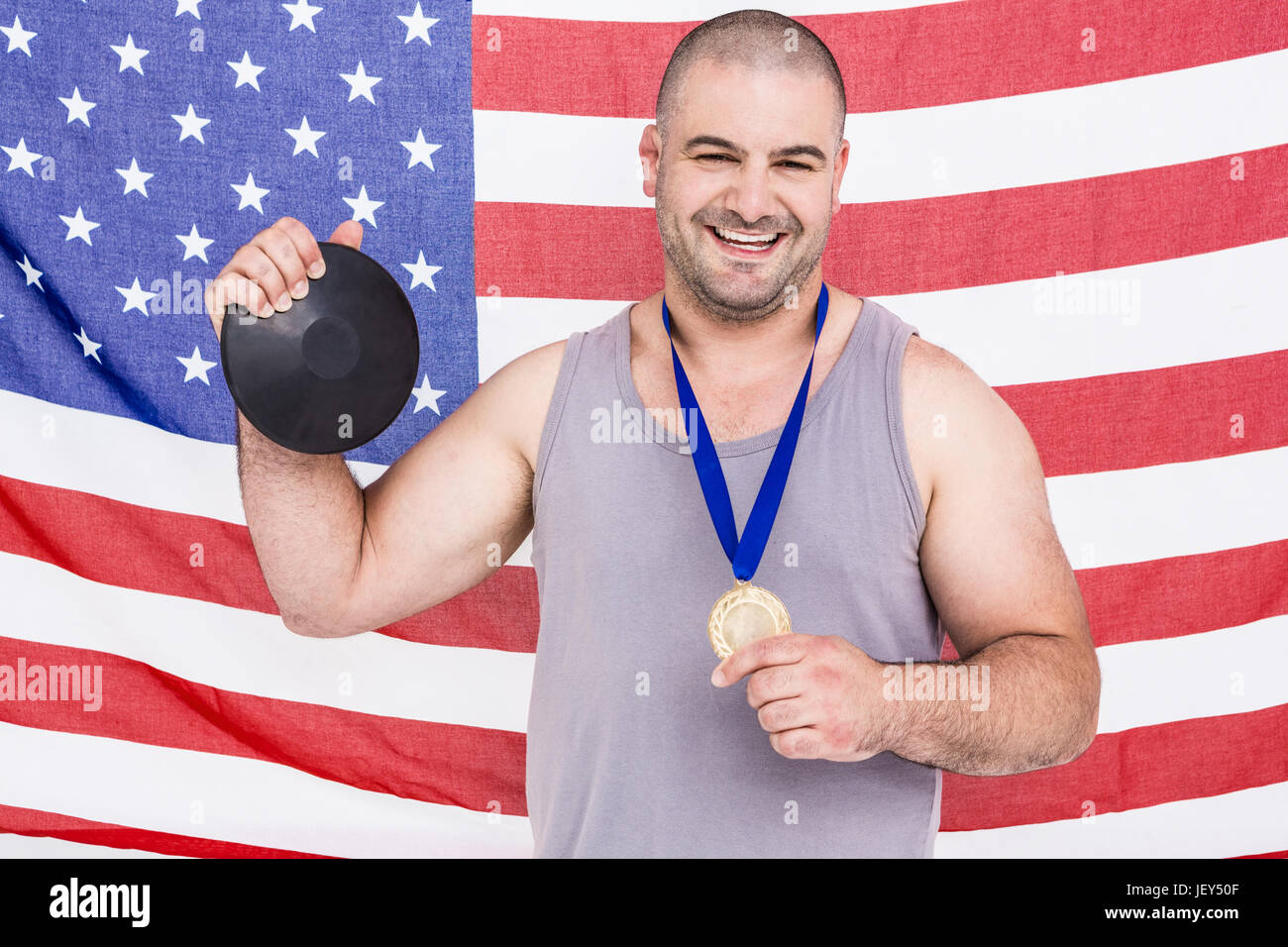 Athlete with olympic gold medal Stock Photo - Alamy