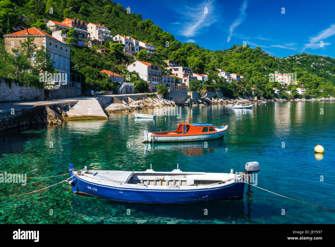Fishing boats and blue waters in the village of Sobra, Mljet Island ...