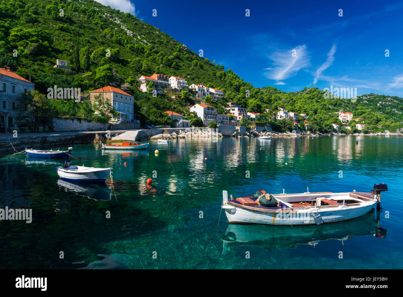Fishing boats and blue waters in the village of Sobra, Mljet Island ...
