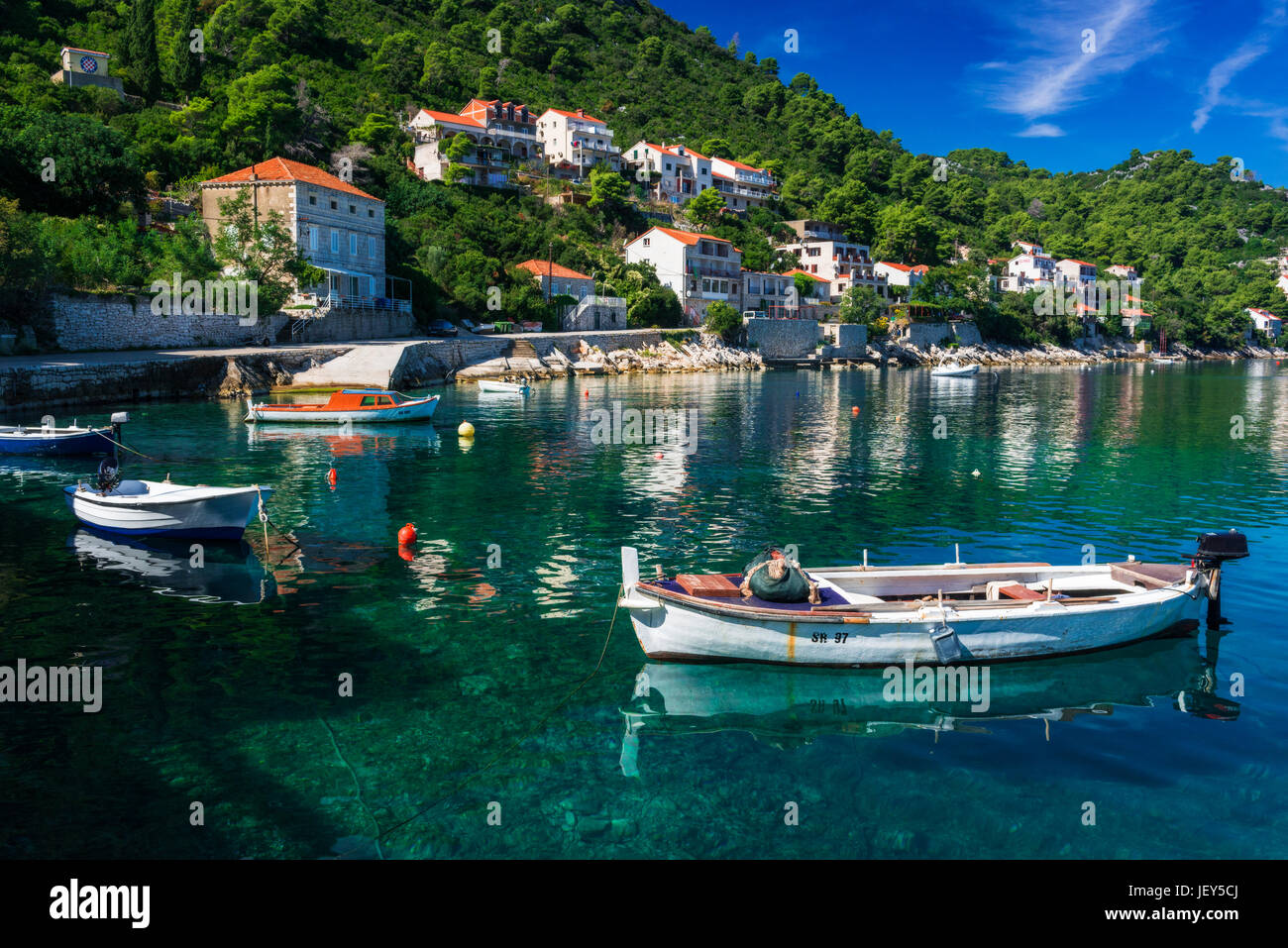 Fishing boats and blue waters in the village of Sobra, Mljet Island ...