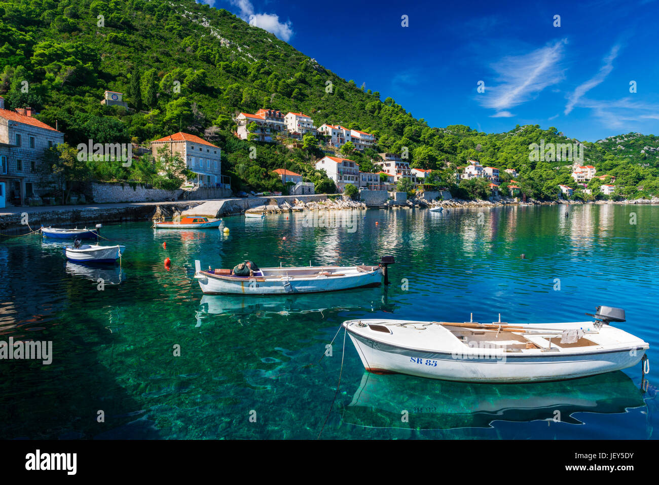 Fishing boats and blue waters in the village of Sobra, Mljet Island ...