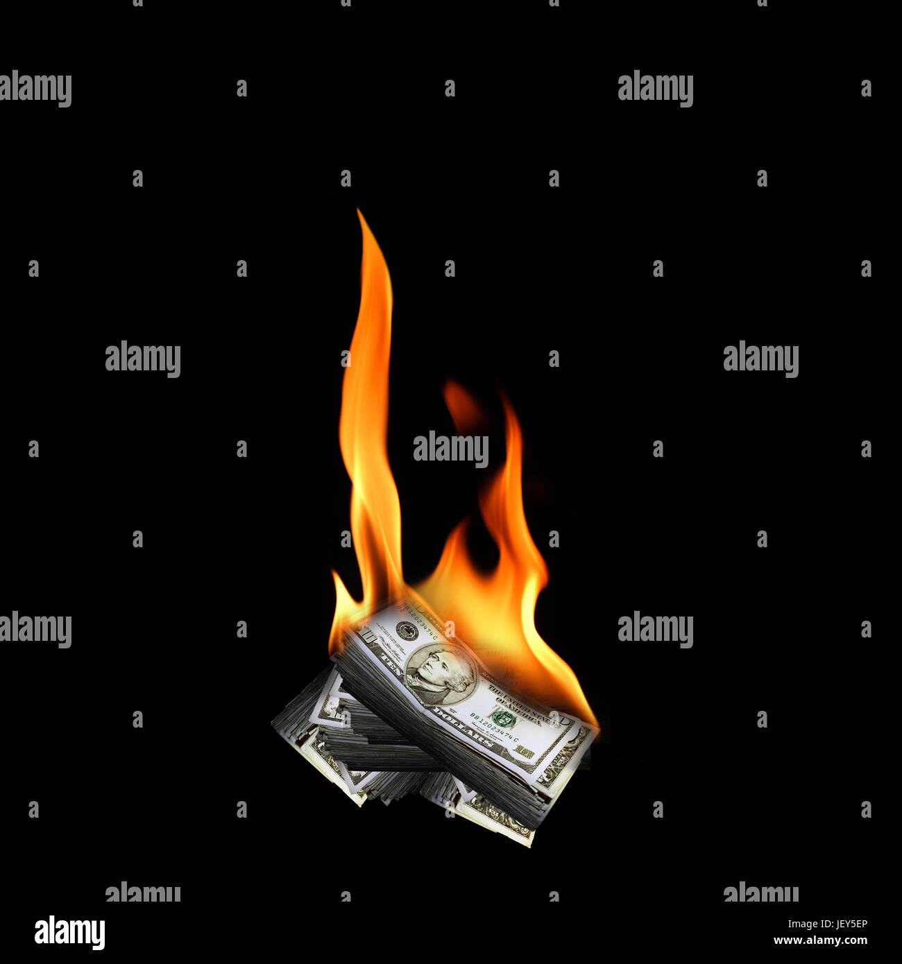 close up shot of burning money over black background Stock Photo - Alamy