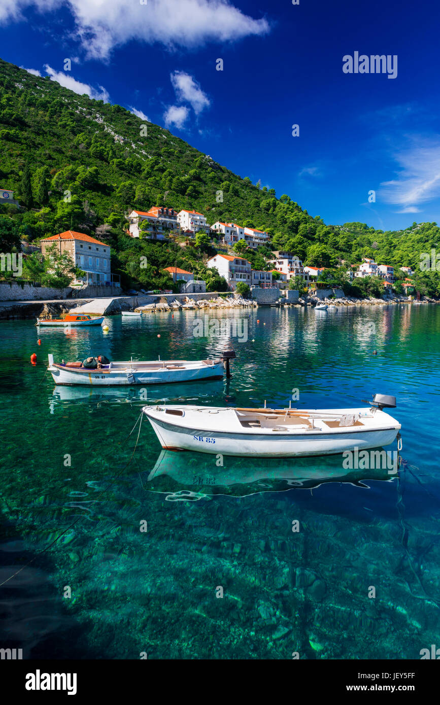 Fishing boats and blue waters in the village of Sobra, Mljet Island ...