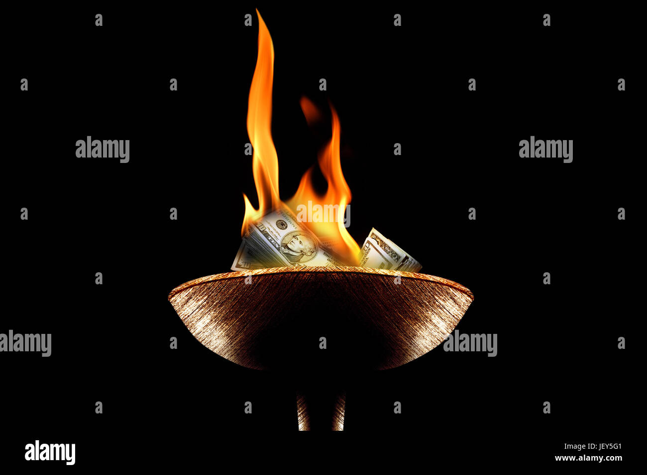 close up shot of money burning in flaming torch Stock Photo - Alamy