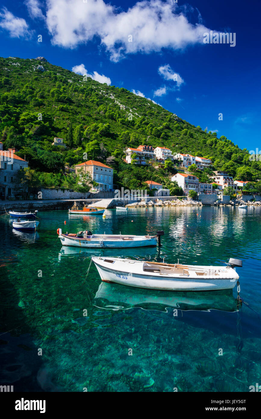 Fishing boats and blue waters in the village of Sobra, Mljet Island ...