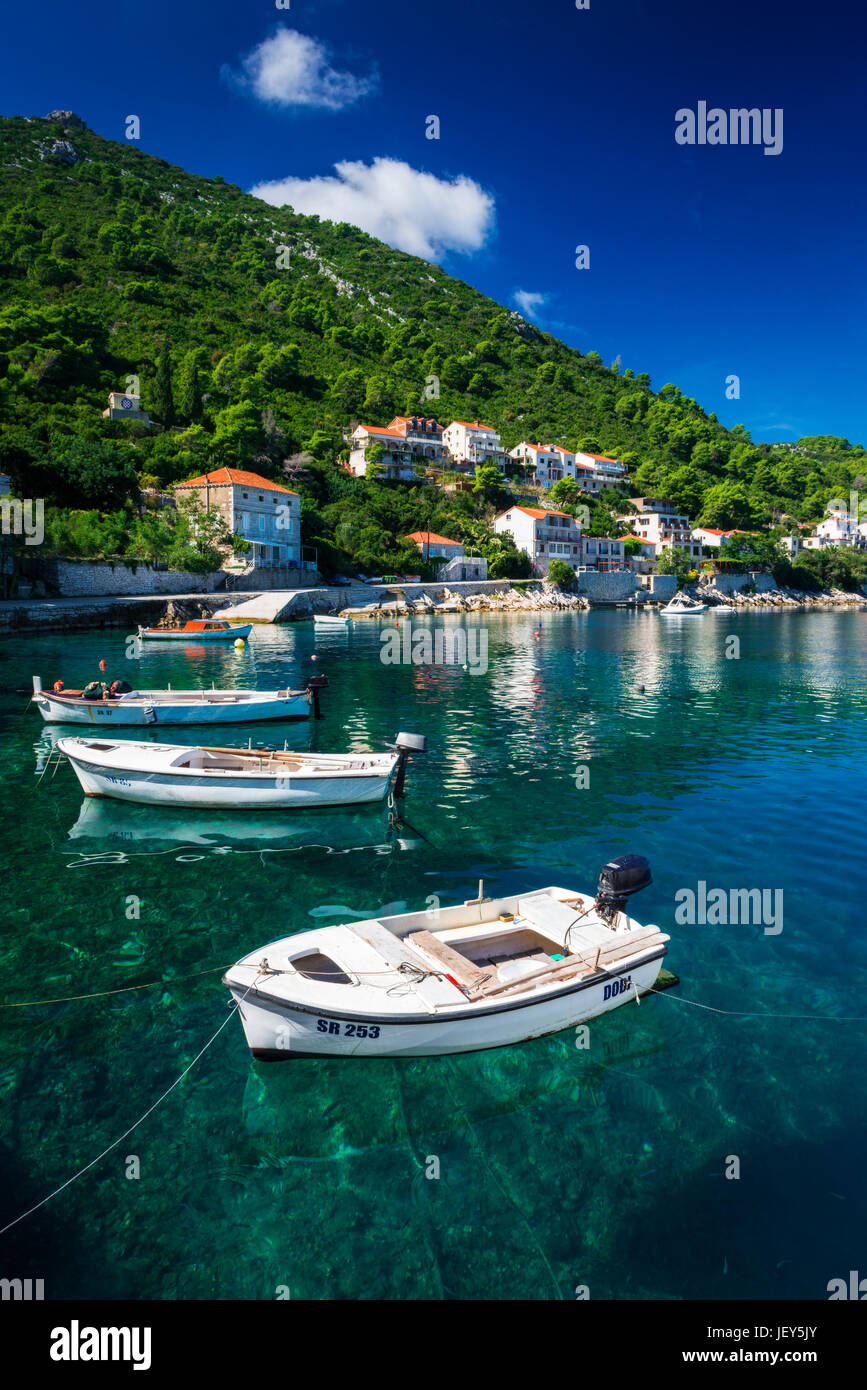 Fishing boats and blue waters in the village of Sobra, Mljet Island ...