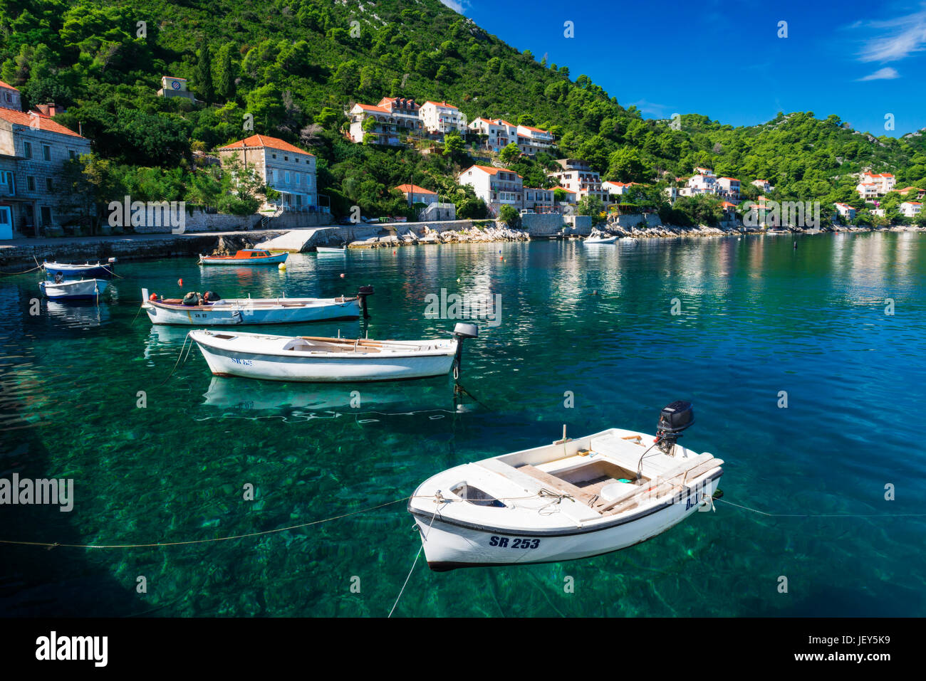 Fishing boats and blue waters in the village of Sobra, Mljet Island ...