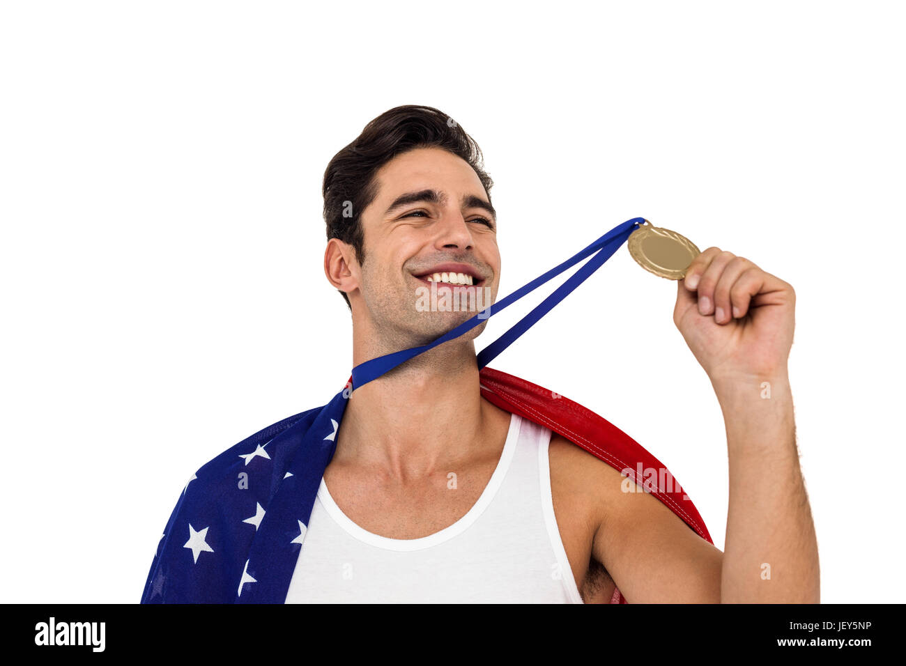 Athlete holding gold medal after victory Stock Photo - Alamy