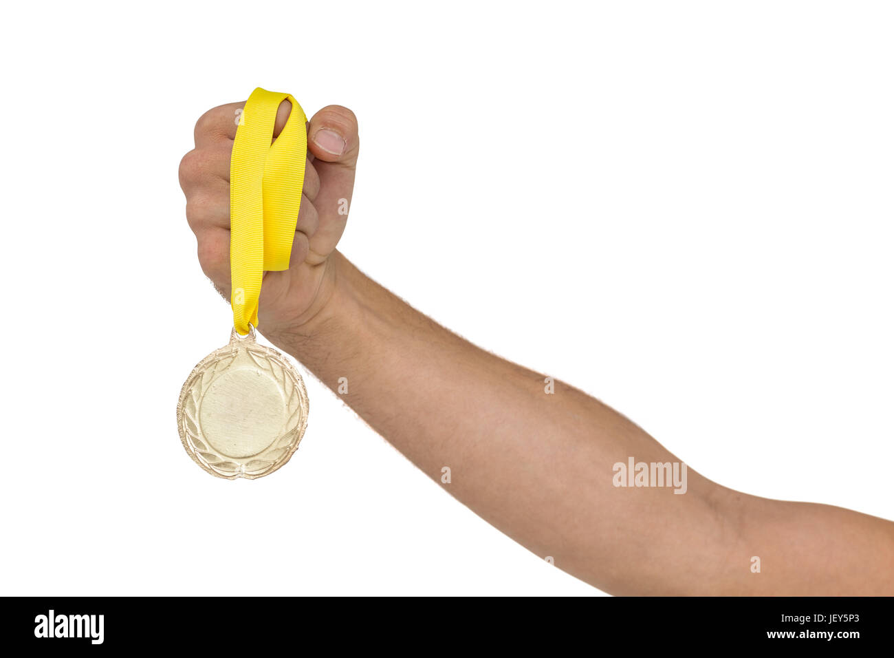 Athlete holding gold medal after victory Stock Photo - Alamy
