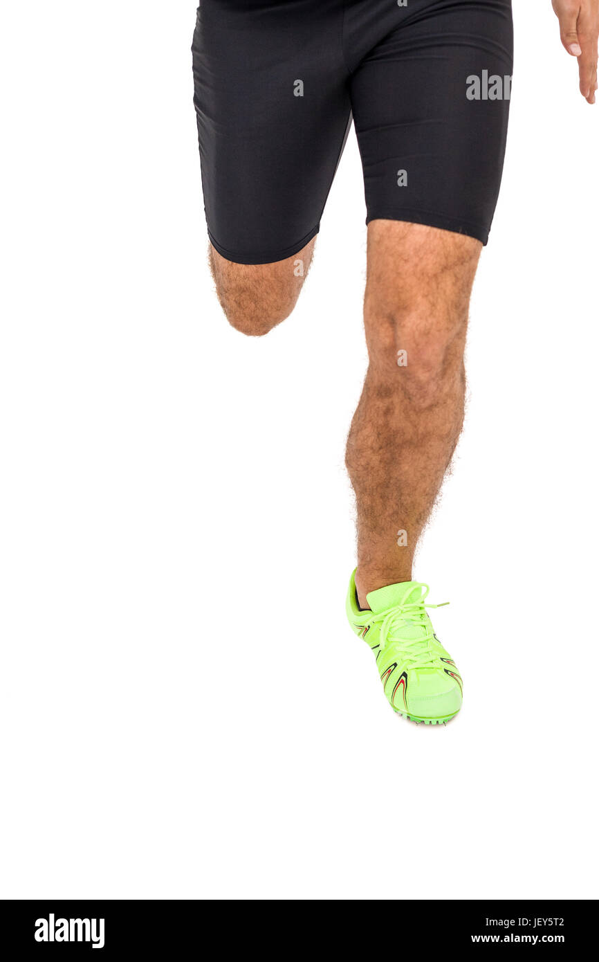 Athlete feet running on white background Stock Photo - Alamy