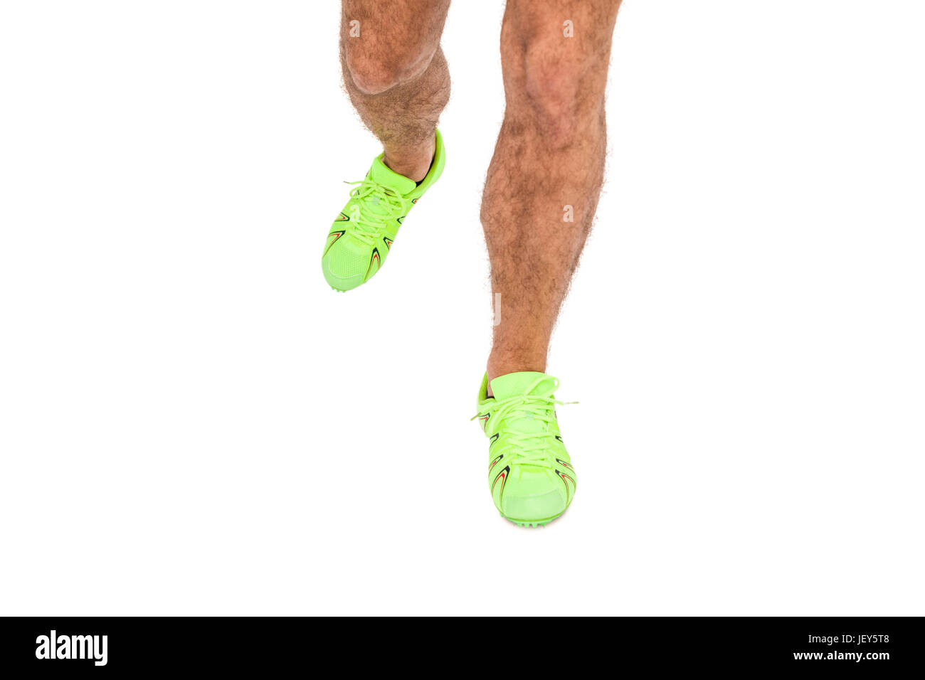 Athlete feet running on white background Stock Photo - Alamy