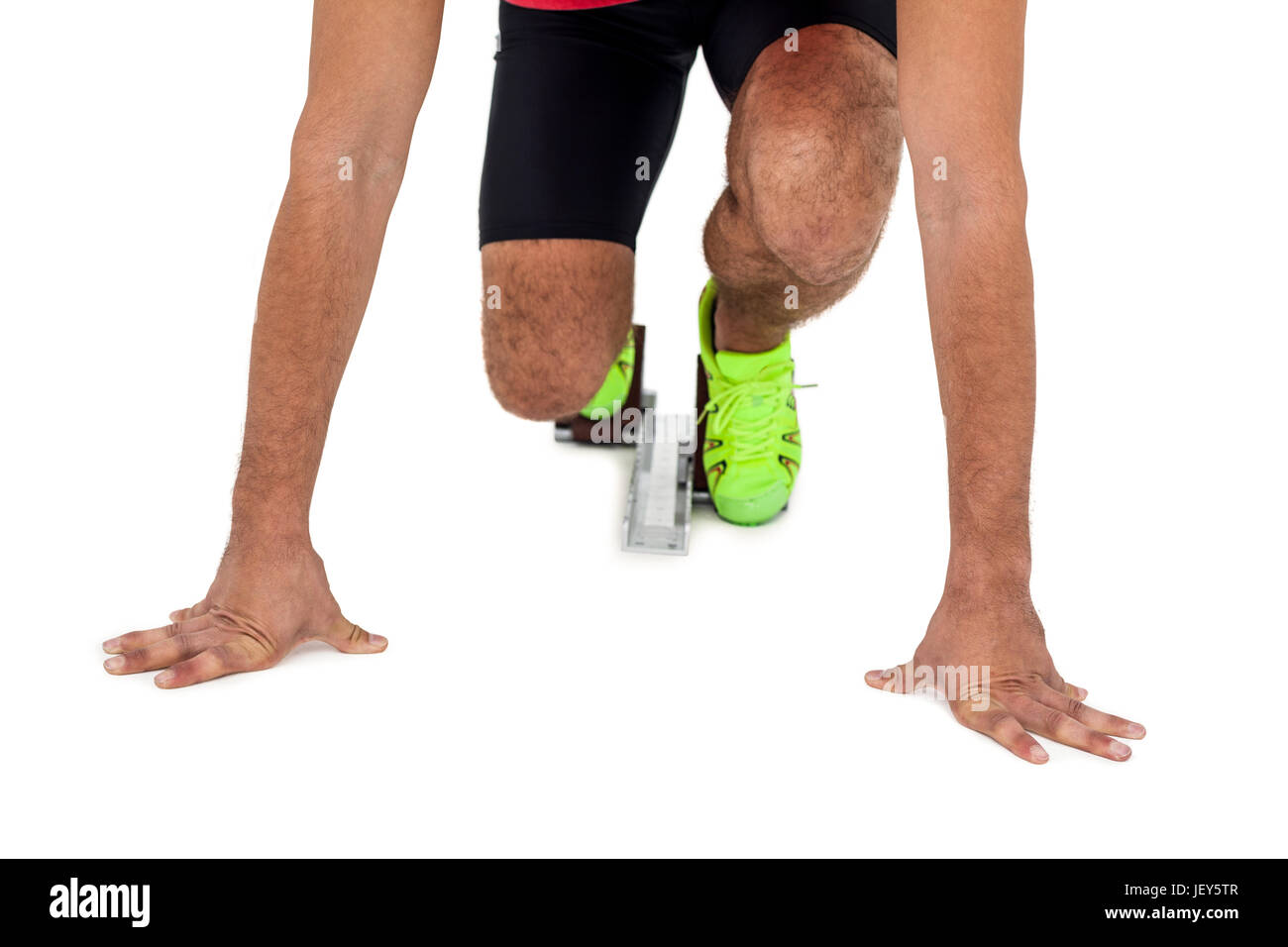 Man in running position hi-res stock photography and images - Alamy