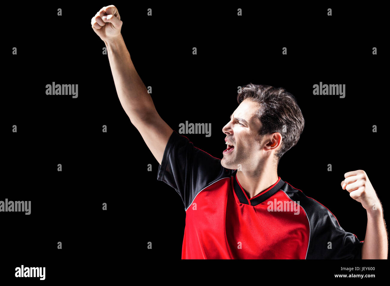 Male athlete posing after victory Stock Photo - Alamy