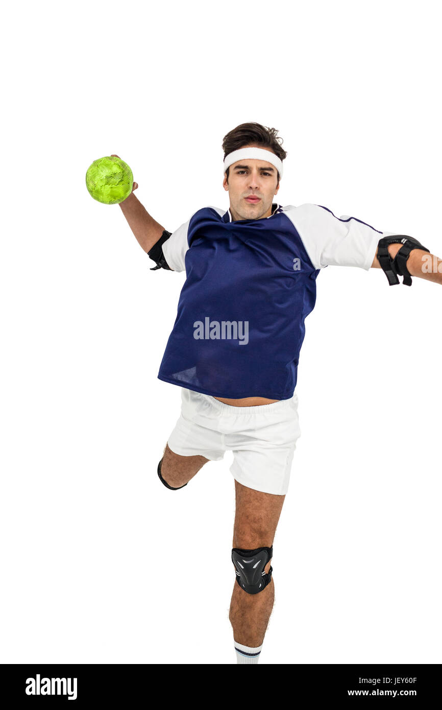 Portrait of sportsman throwing a ball Stock Photo - Alamy