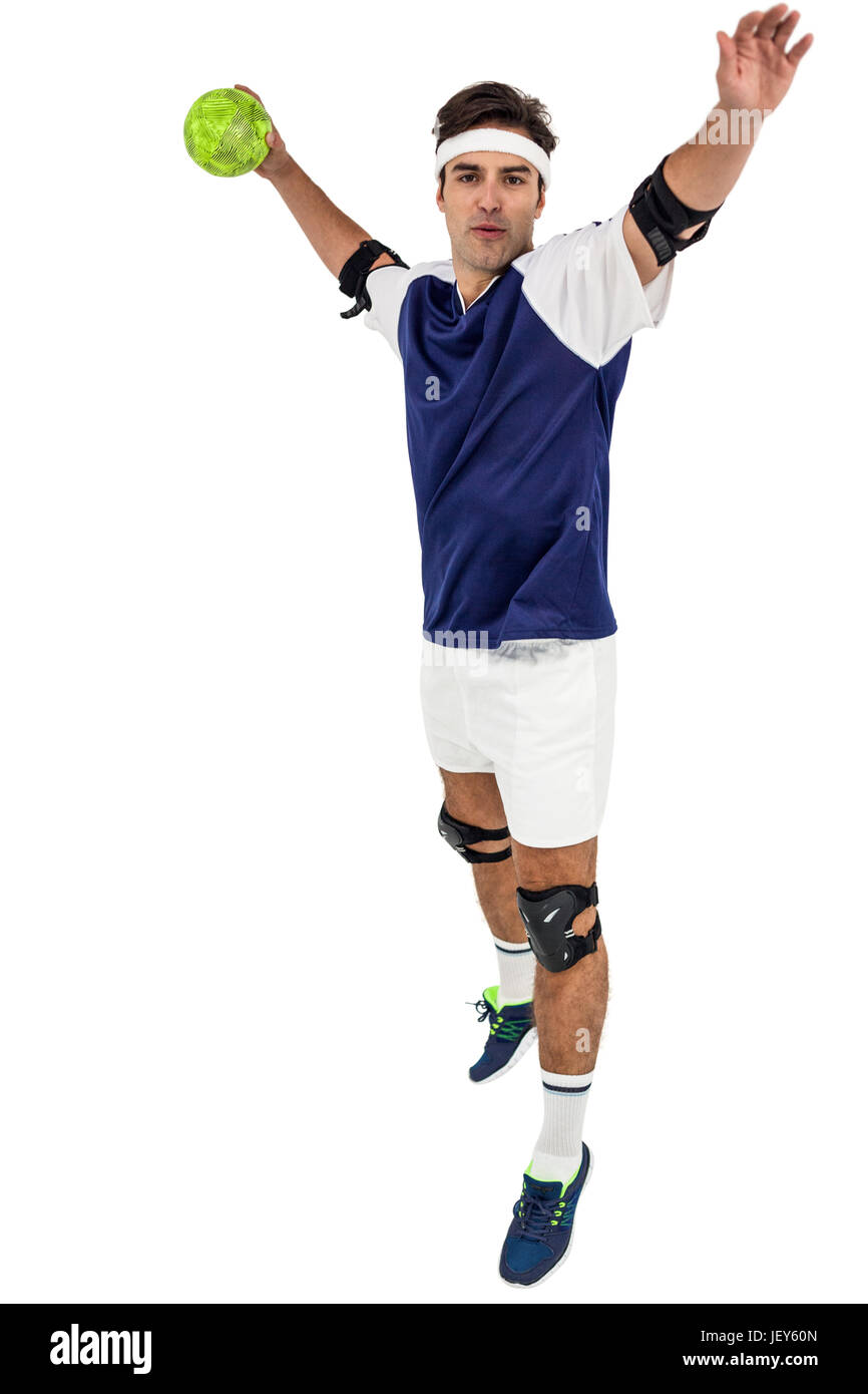Portrait of sportsman throwing a ball Stock Photo - Alamy