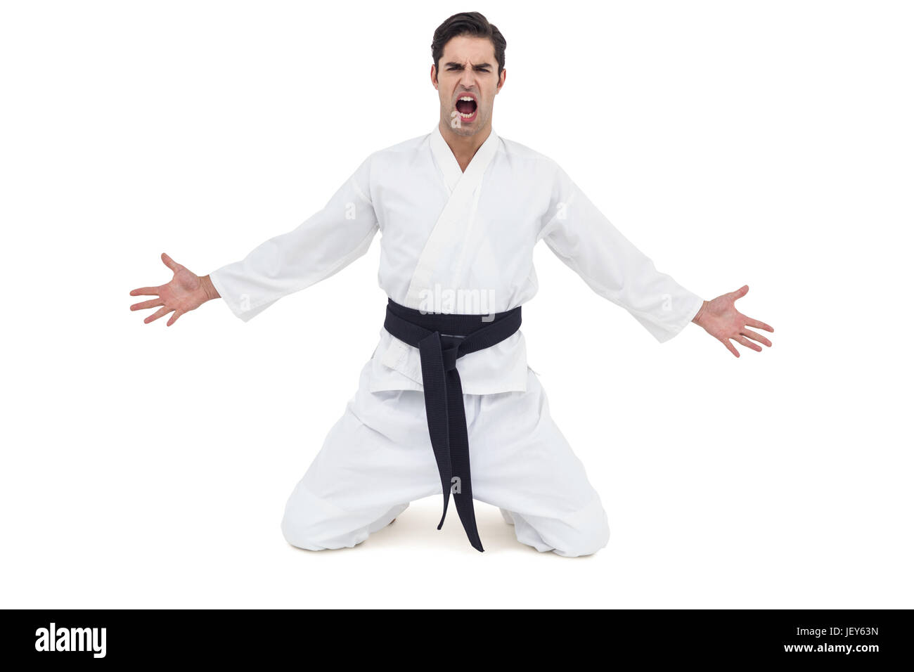 Fighter posing after victory Stock Photo - Alamy