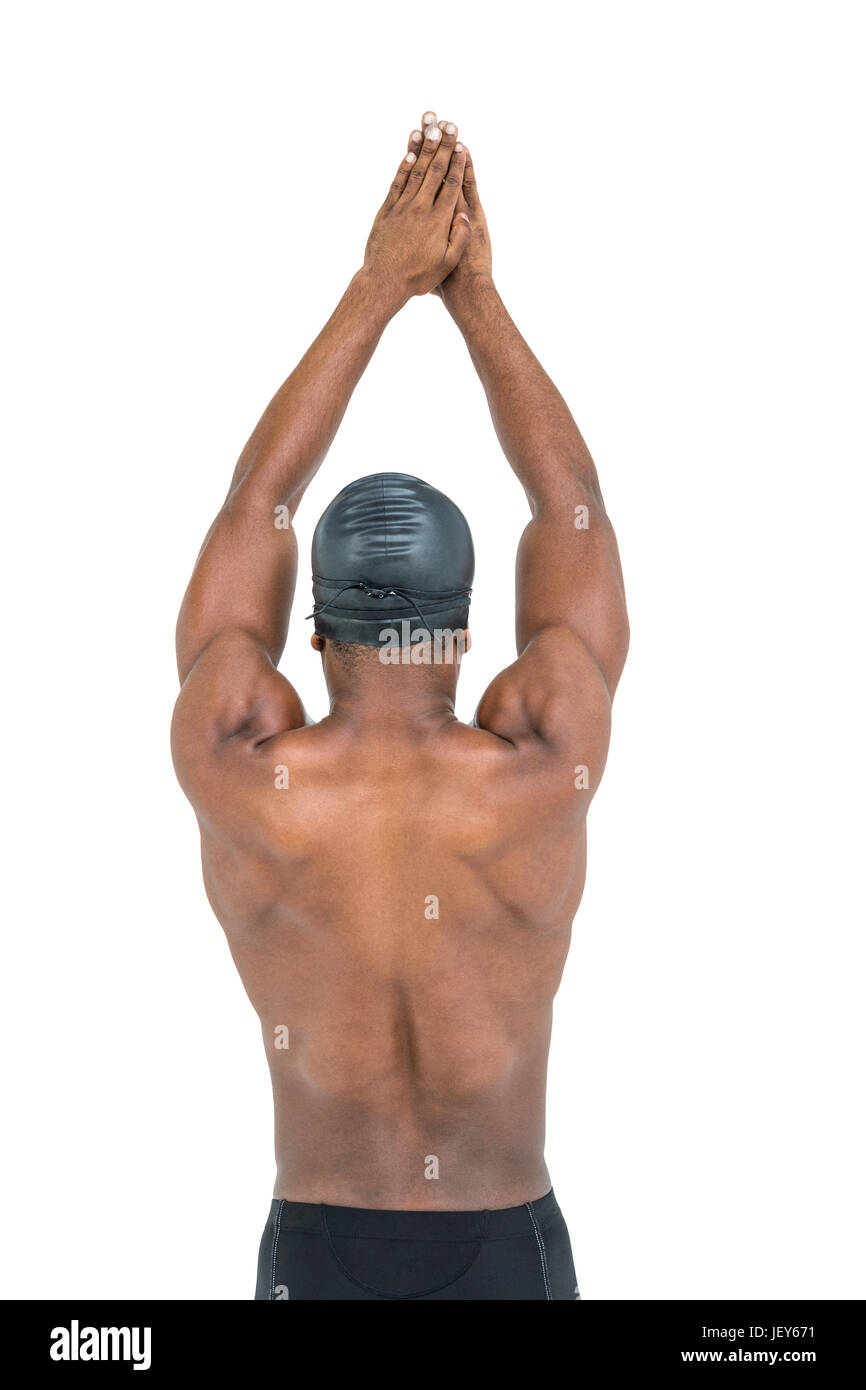 Rear view of swimmer ready to dive Stock Photo - Alamy