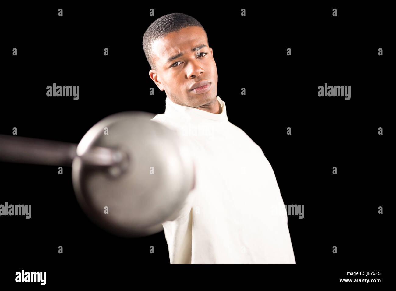 Swordsman practicing with fencing sword Stock Photo - Alamy