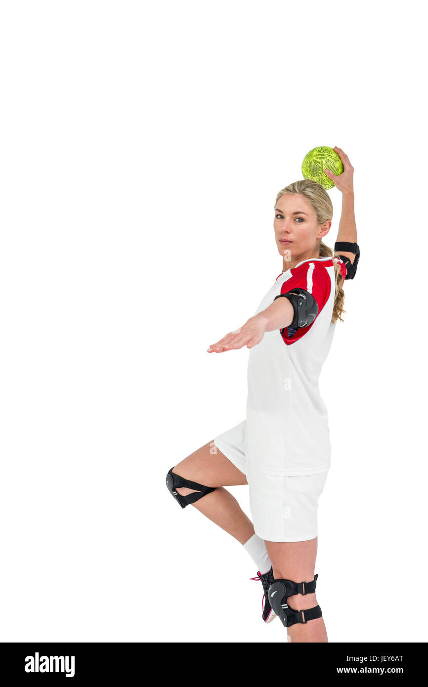 Sportswoman throwing a ball Stock Photo - Alamy