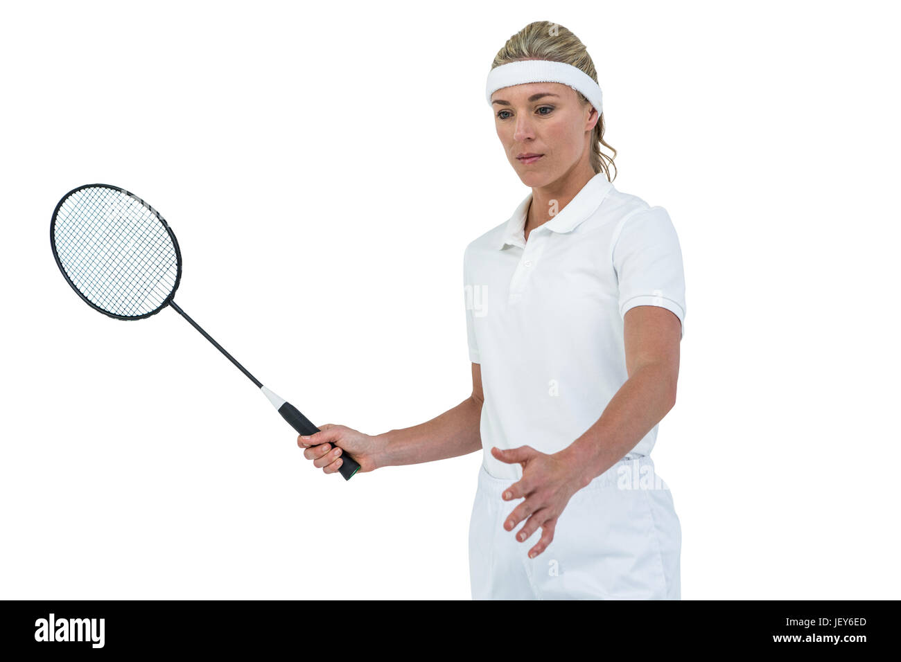 Female athlete playing badminton Stock Photo - Alamy