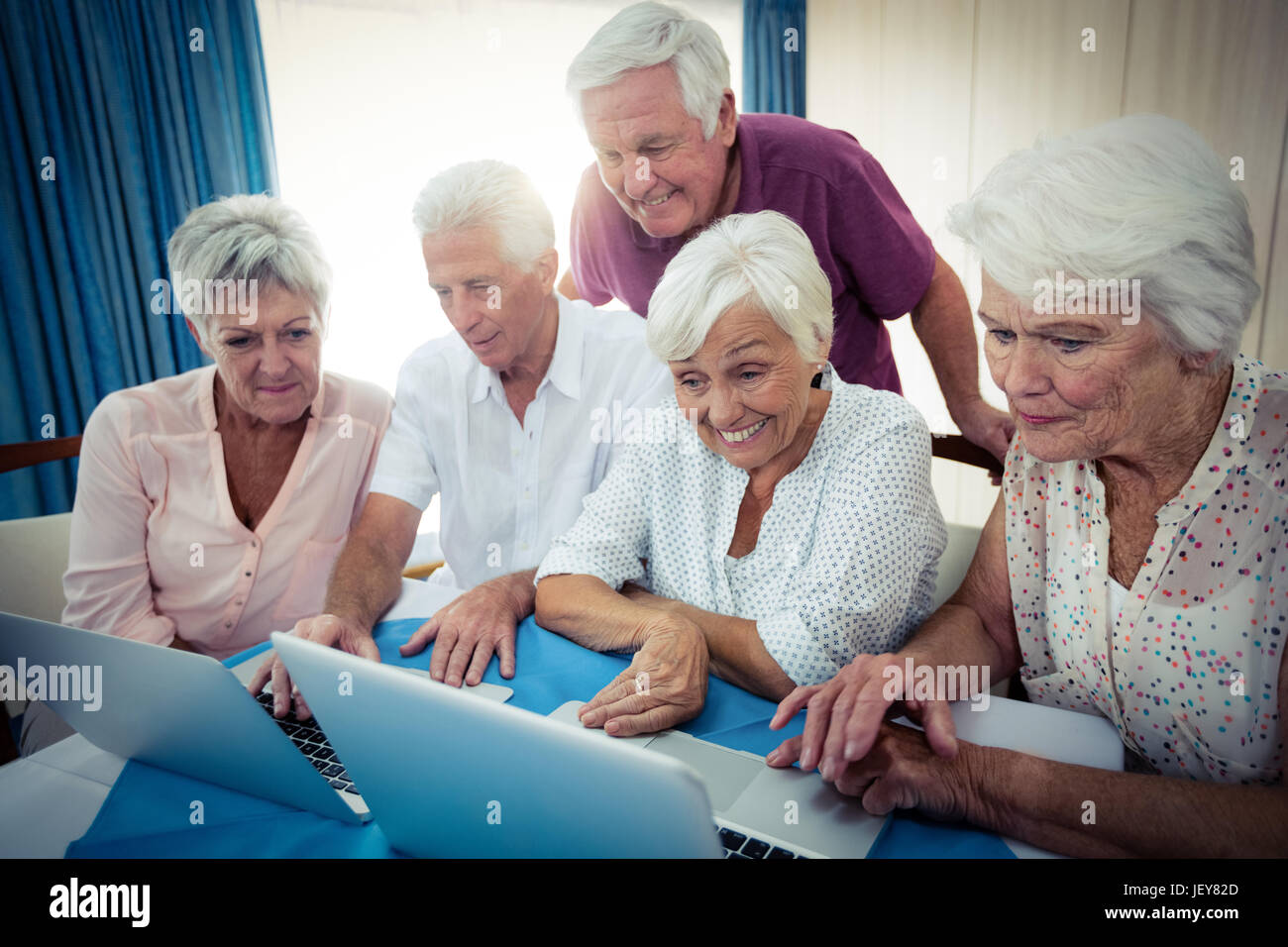 Group of seniors using a computer Stock Photo - Alamy